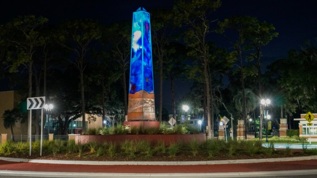 Glowing blue obelisk dedicated as public art at JU main gate | Jacksonville Today